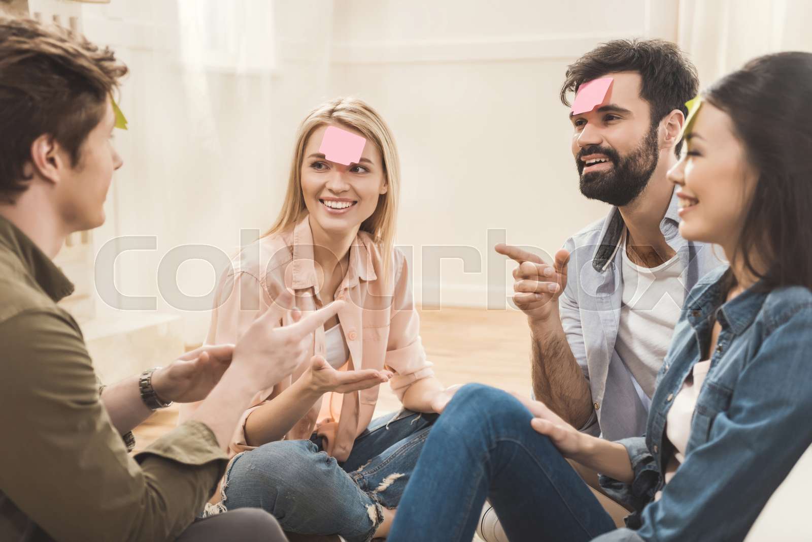 people playing game guess who | Stock image | Colourbox