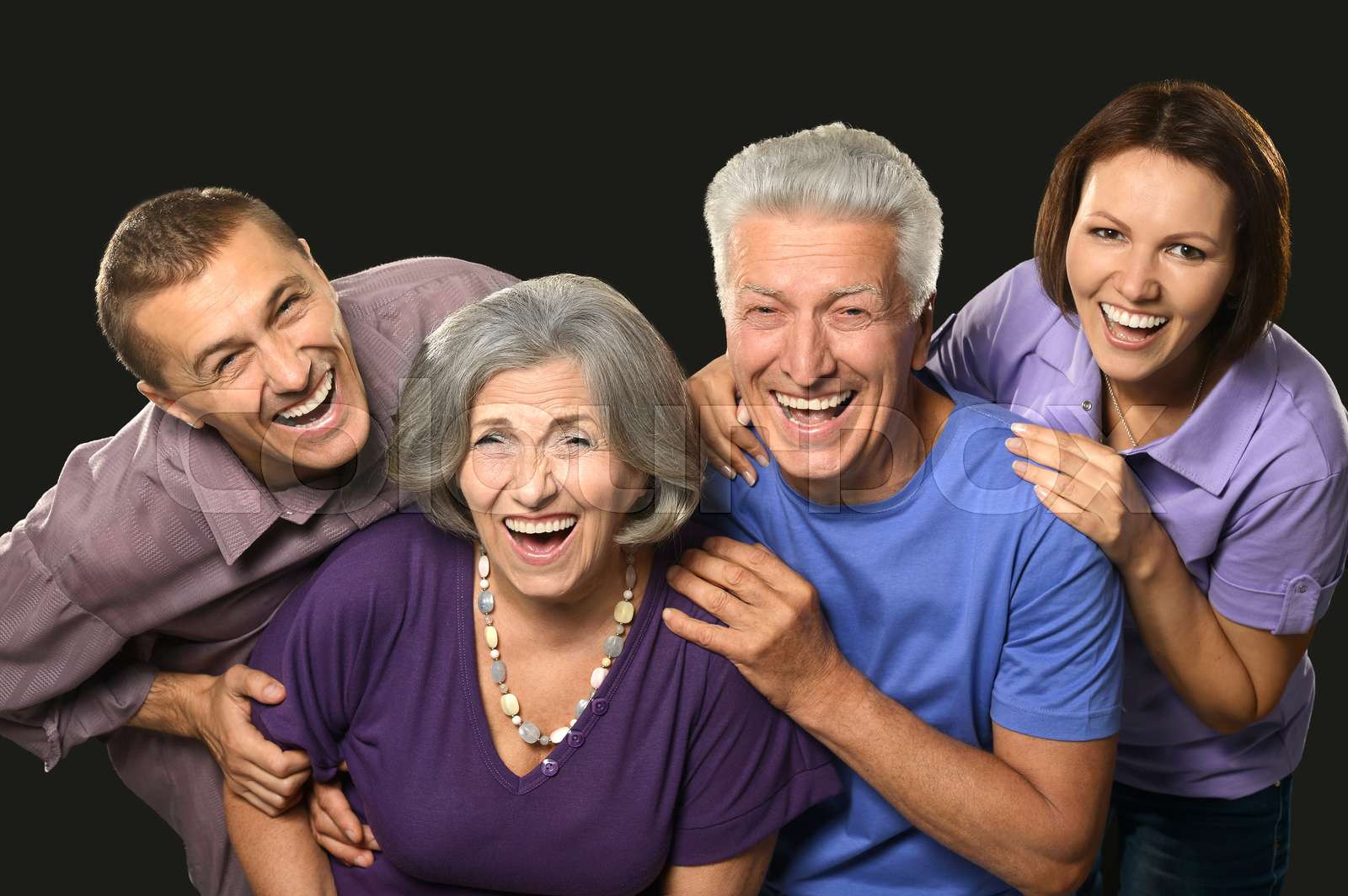 Happy parents with grown-up children | Stock image | Colourbox