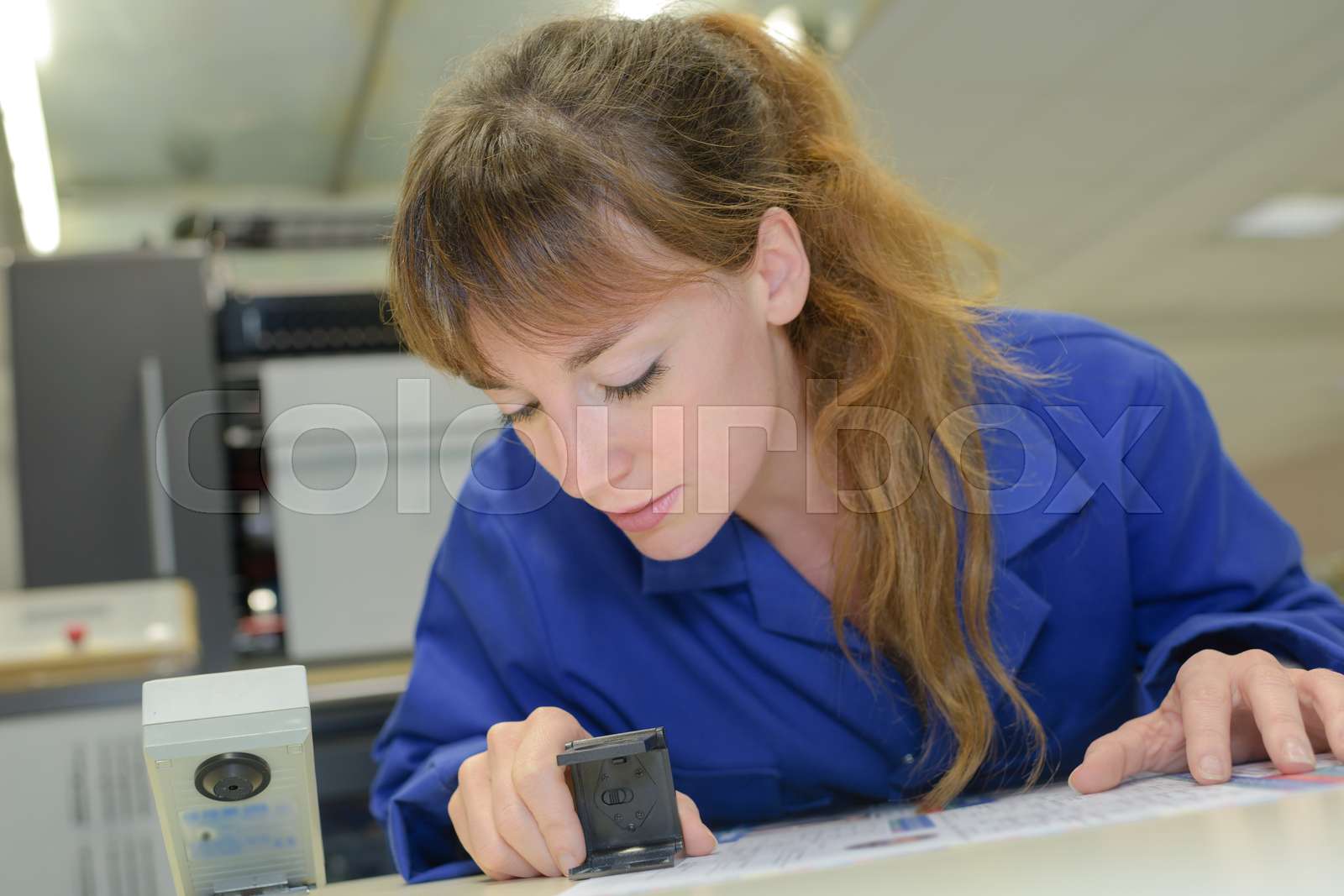 printing worker at work | Stock image | Colourbox