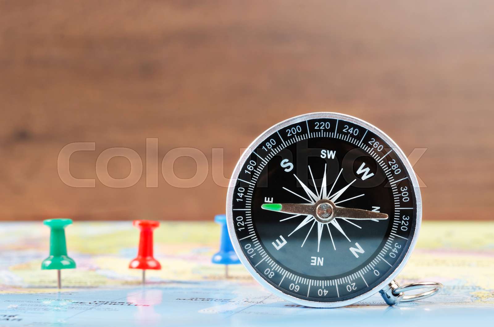 Compass on world map. | Stock image | Colourbox
