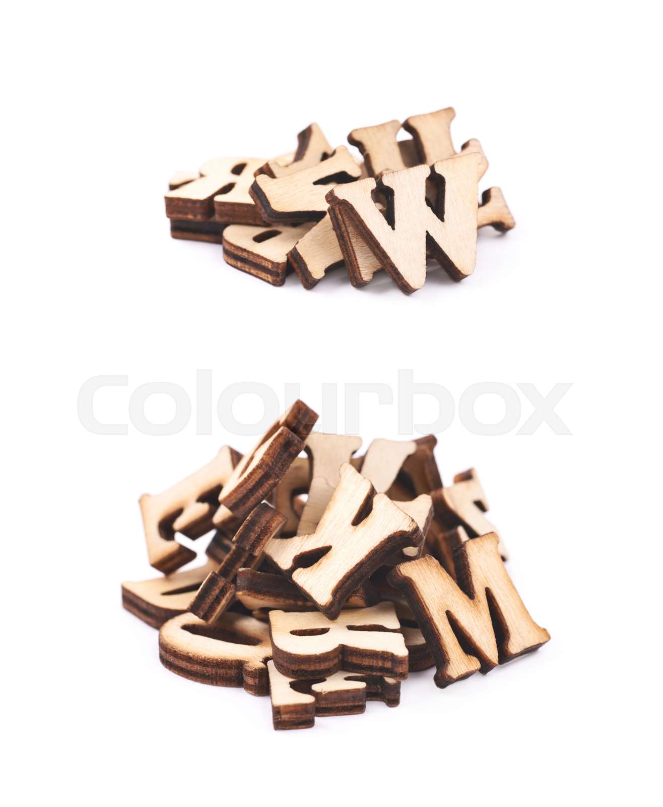 Pile of wood carved letters isolated | Stock image | Colourbox