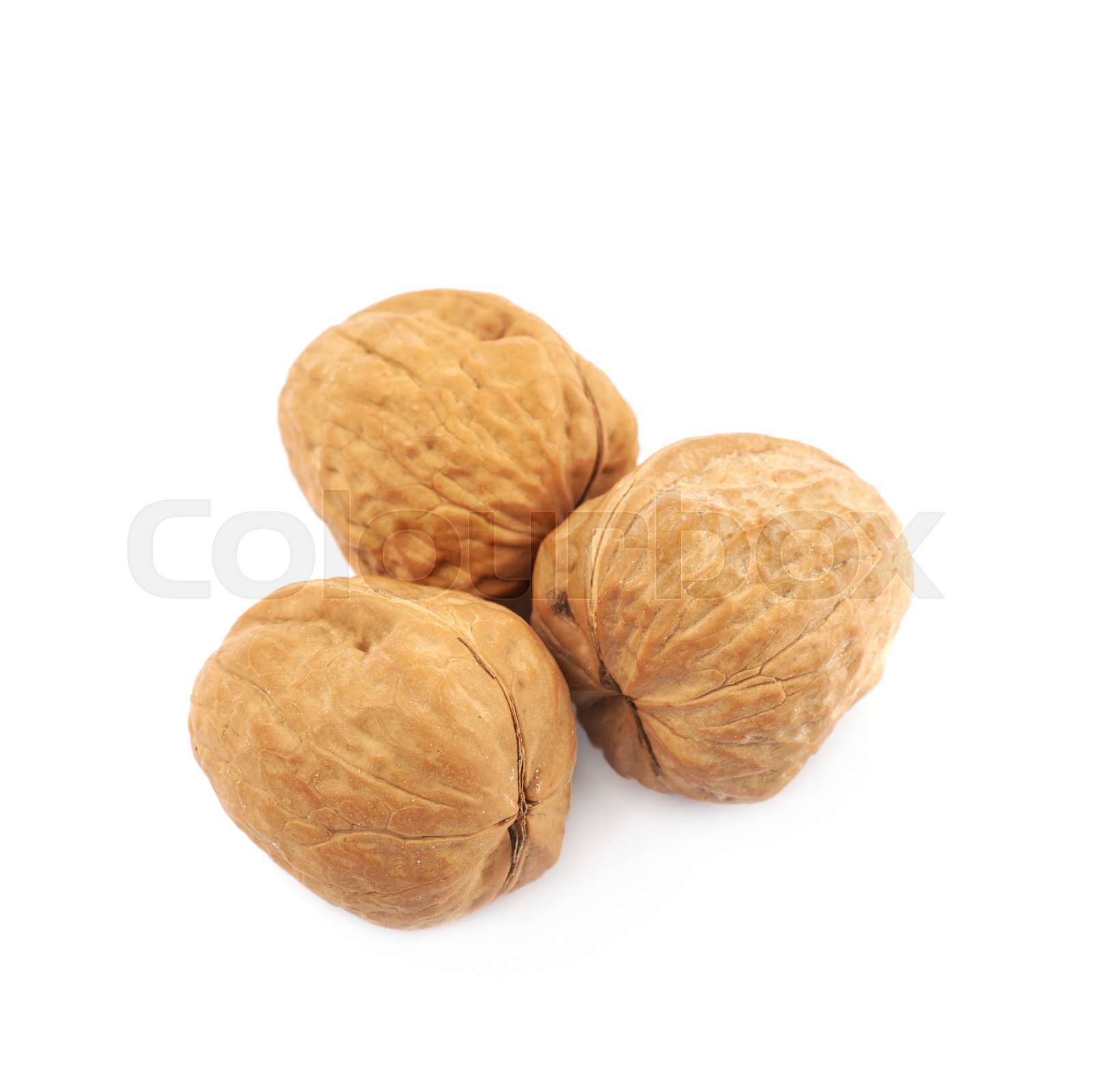 Pile of walnuts isolated | Stock image | Colourbox