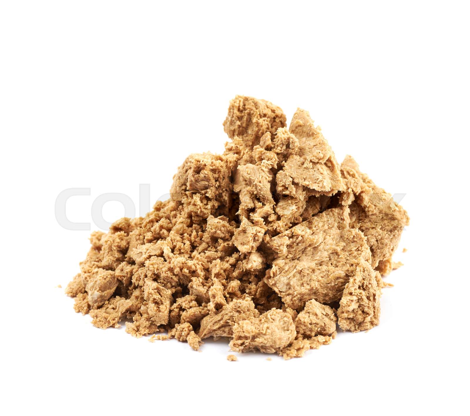 Pile of crushed halva isolated | Stock image | Colourbox