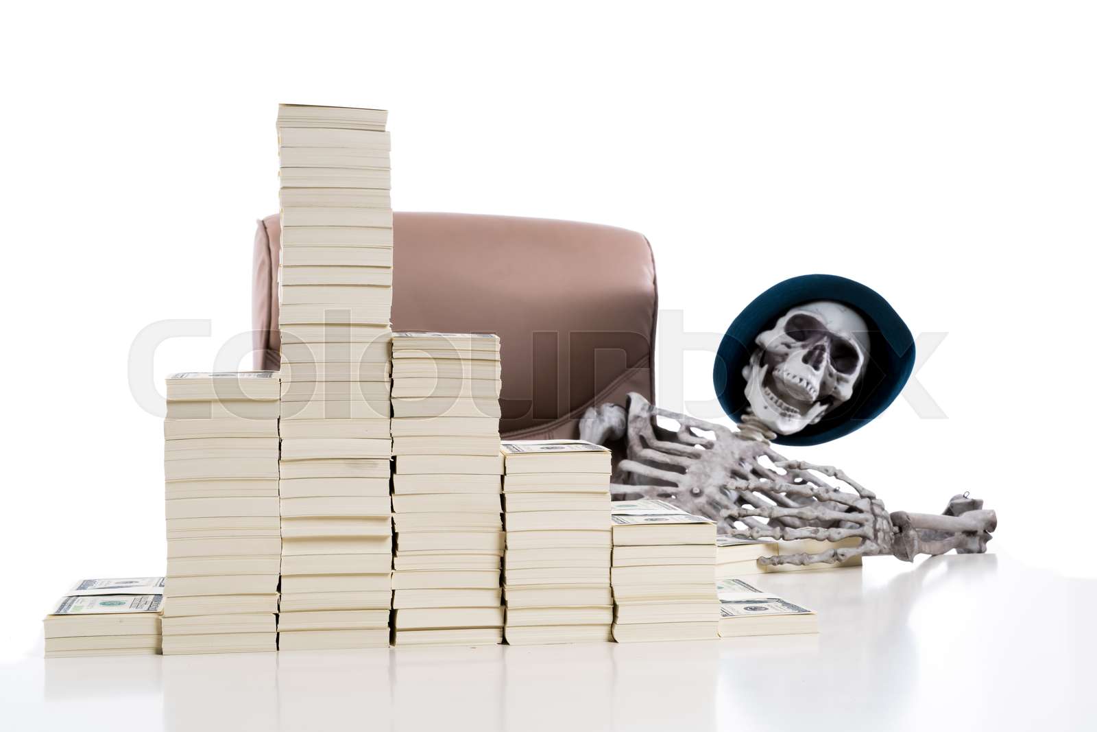 The skeleton of rich man lying dead behind a pile of money | Stock ...