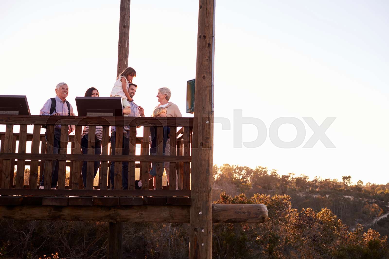 Multi Generation Family Standing On Outdoor Observation Deck | Stock ...