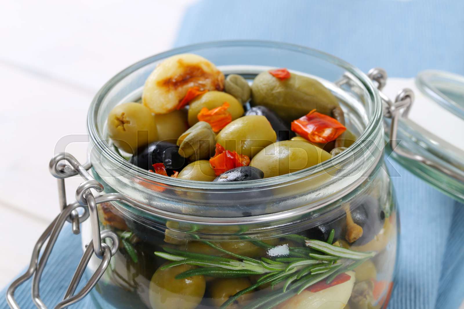 pickled olives, capers, caper berries and garlic | Stock image | Colourbox