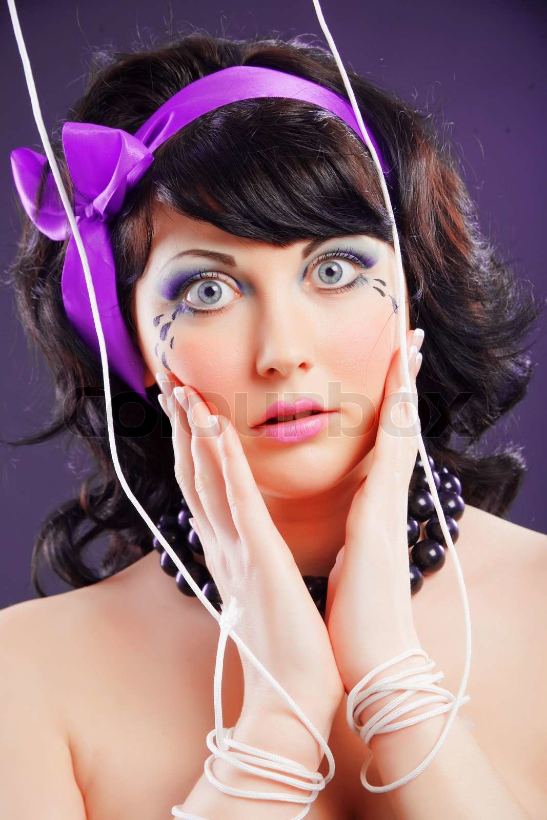 Closeup portrait of a woman puppet | Stock image | Colourbox