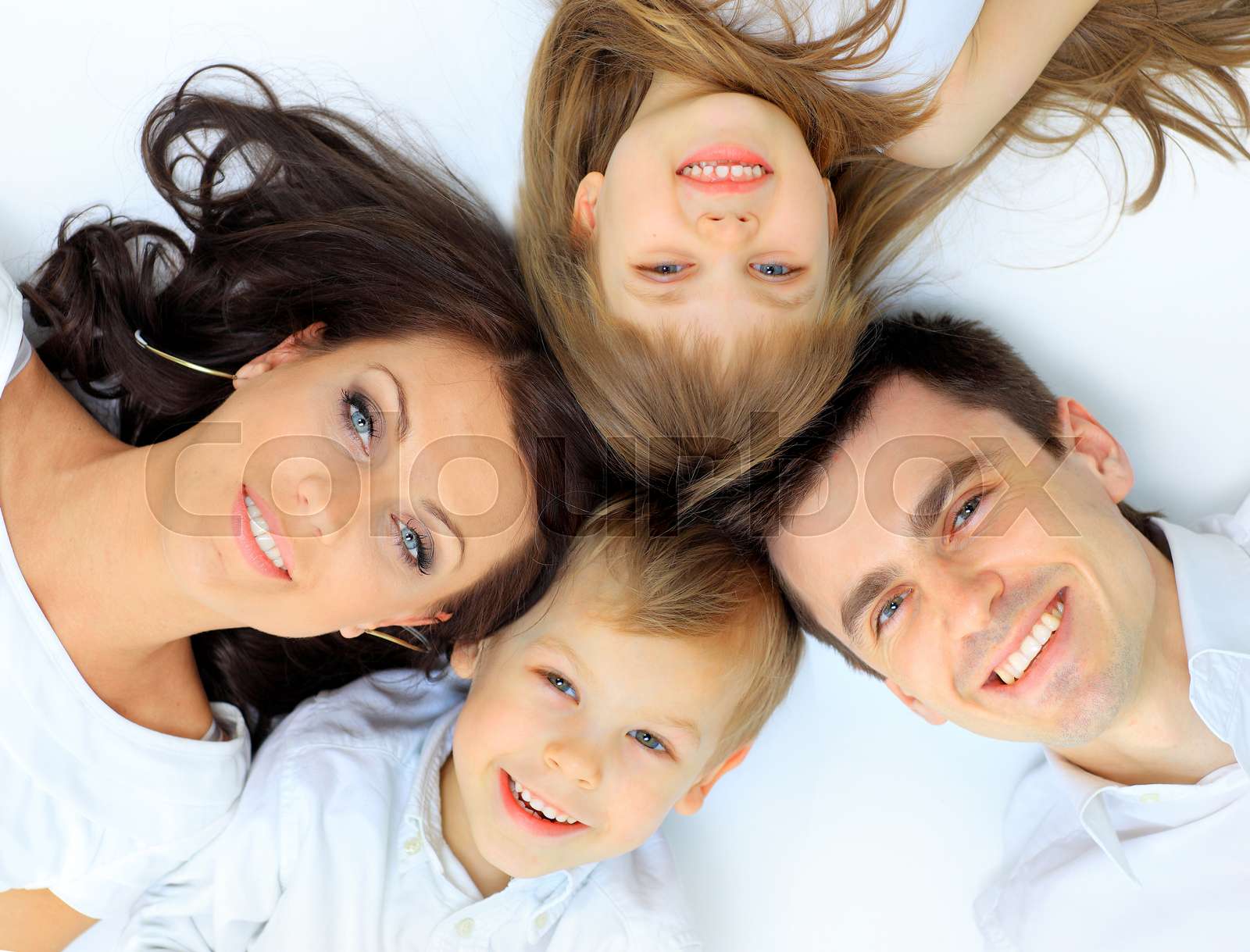 Family lying down | Stock image | Colourbox