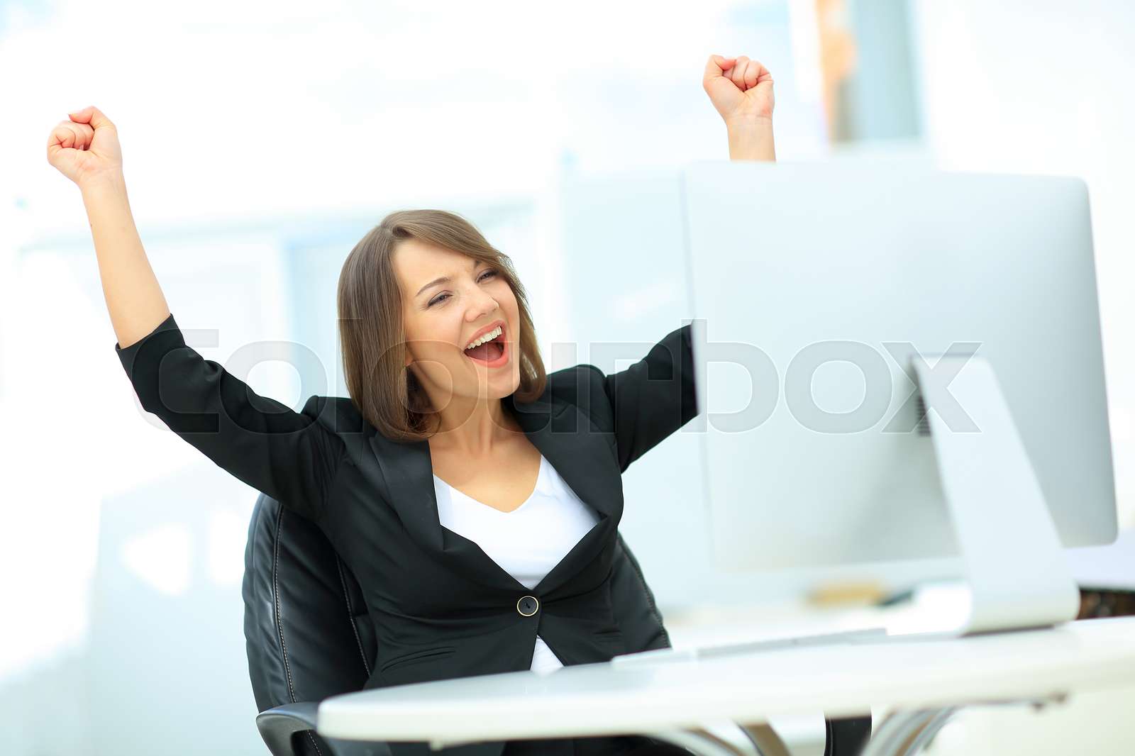 Exited, successful business woman | Stock image | Colourbox
