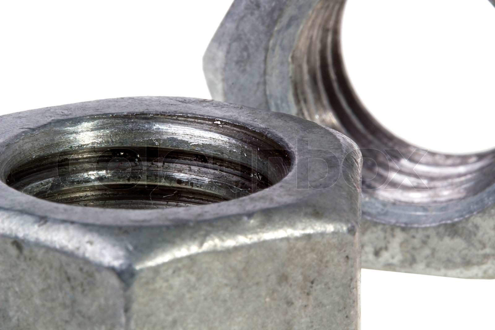 Close-up von Metall- Muttern auf weißem Hintergrund | Stock Bild ...