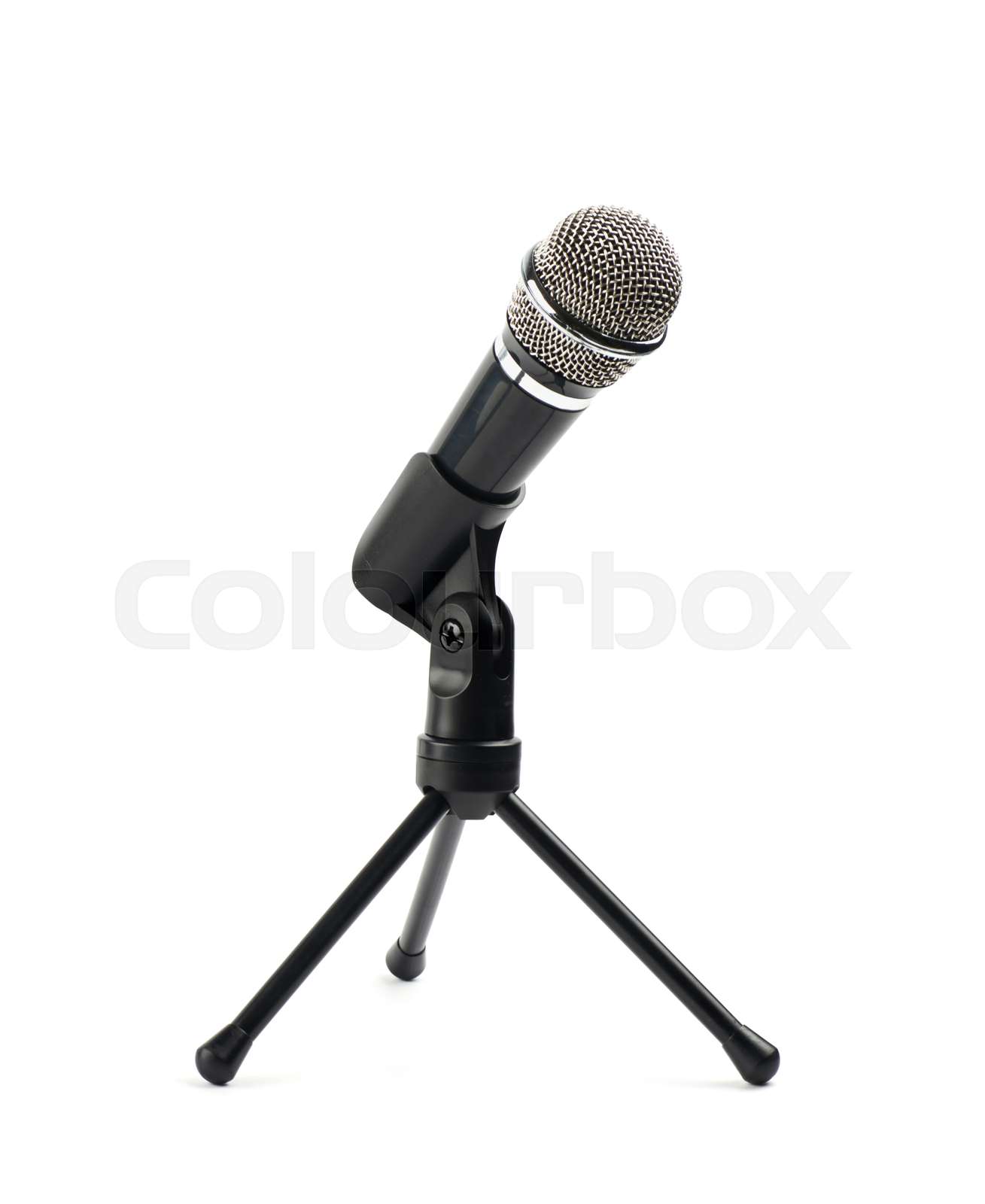 Black microphone on a rack isolated | Stock image | Colourbox
