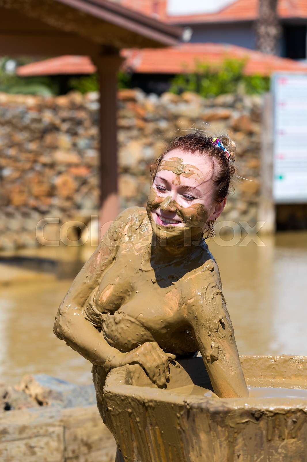 Young girls take mud baths to improve the condition of the skin and strengthen the immune system ...