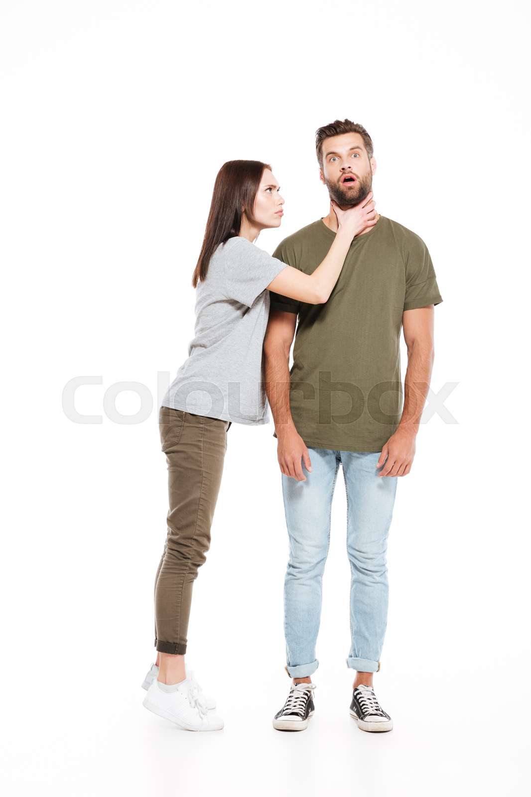 Woman choking her man | Stock image | Colourbox