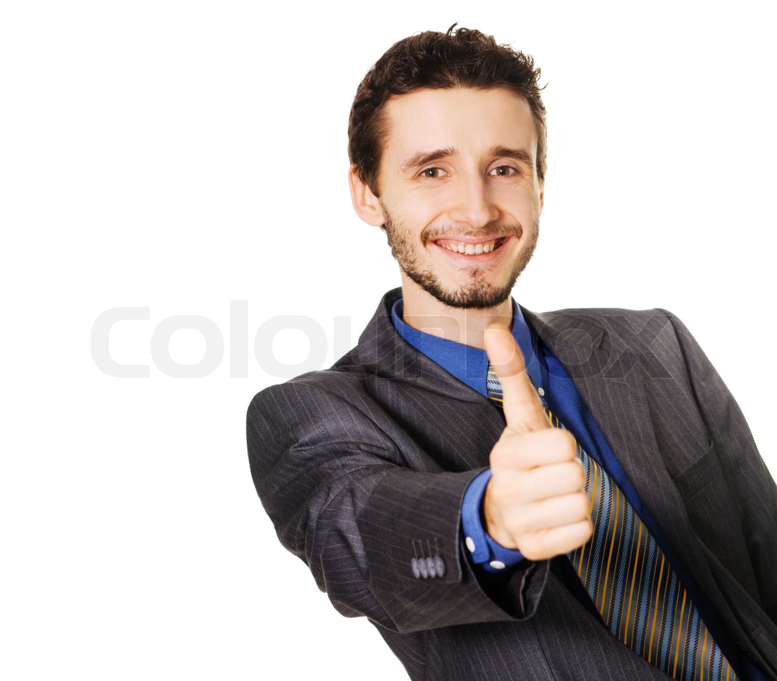 Freundlich handsome businessman zeigt Daumen hoch Zeichen | Stock Bild | Colourbox