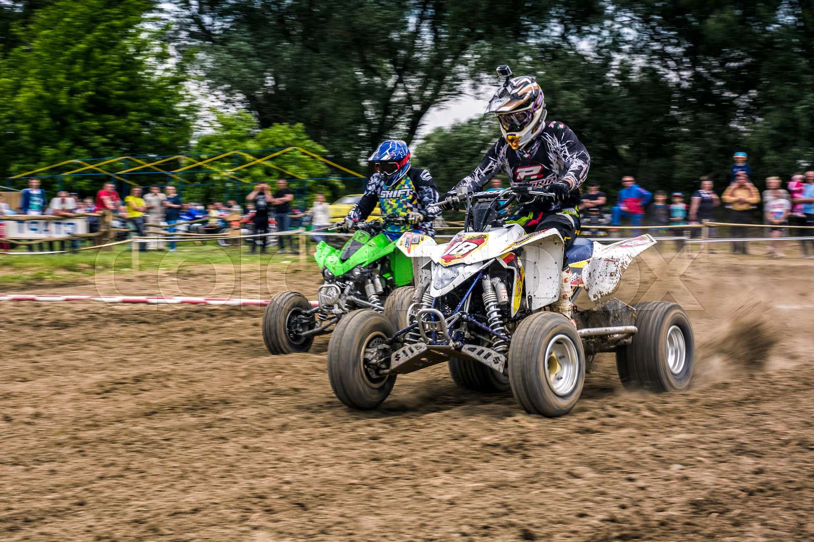 ATV Rider on start in the action. | Stock image | Colourbox