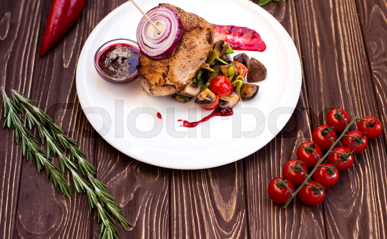 Steak on a rustic wooden table in a country steakhouse | Stock image ...
