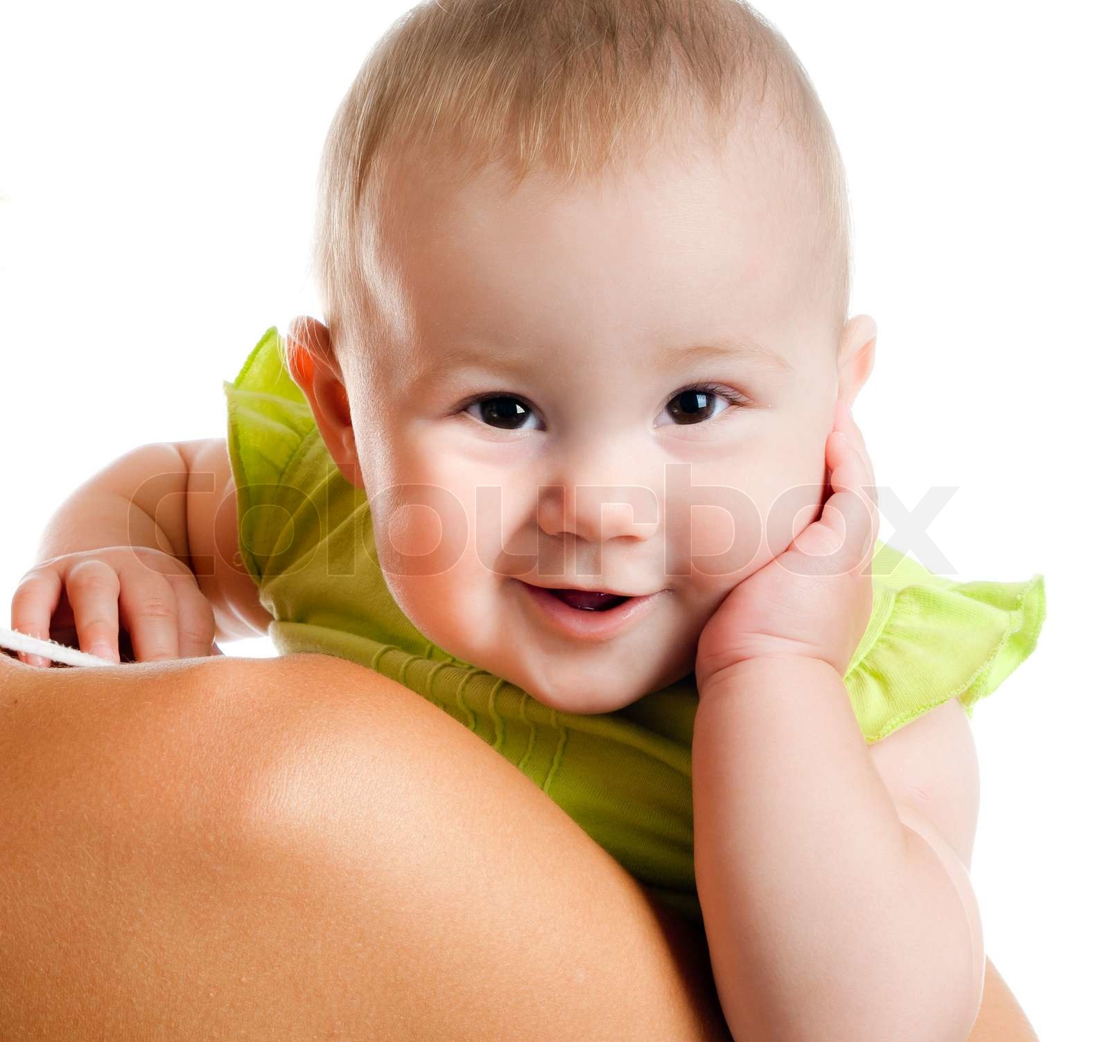 kleines Kind auf einem weißen Hintergrund | Stock Bild | Colourbox