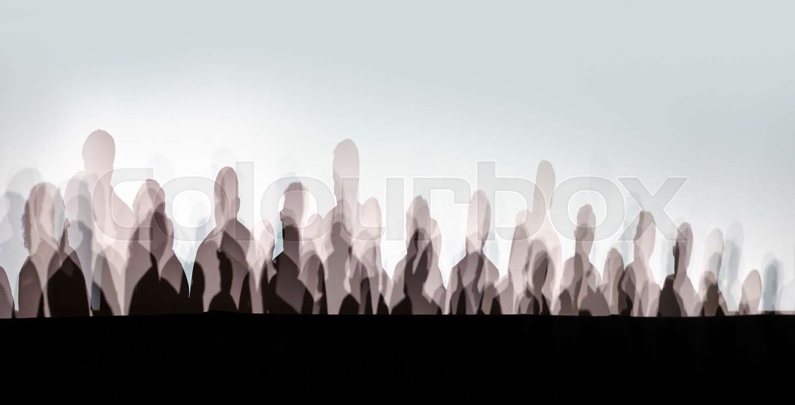 People shadows on white wall | Stock image | Colourbox