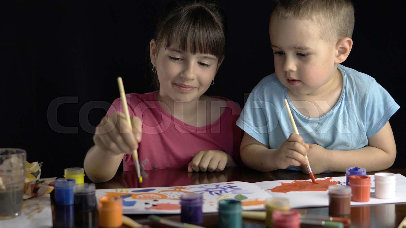 Happy Painting by Two Kids | Stock image | Colourbox