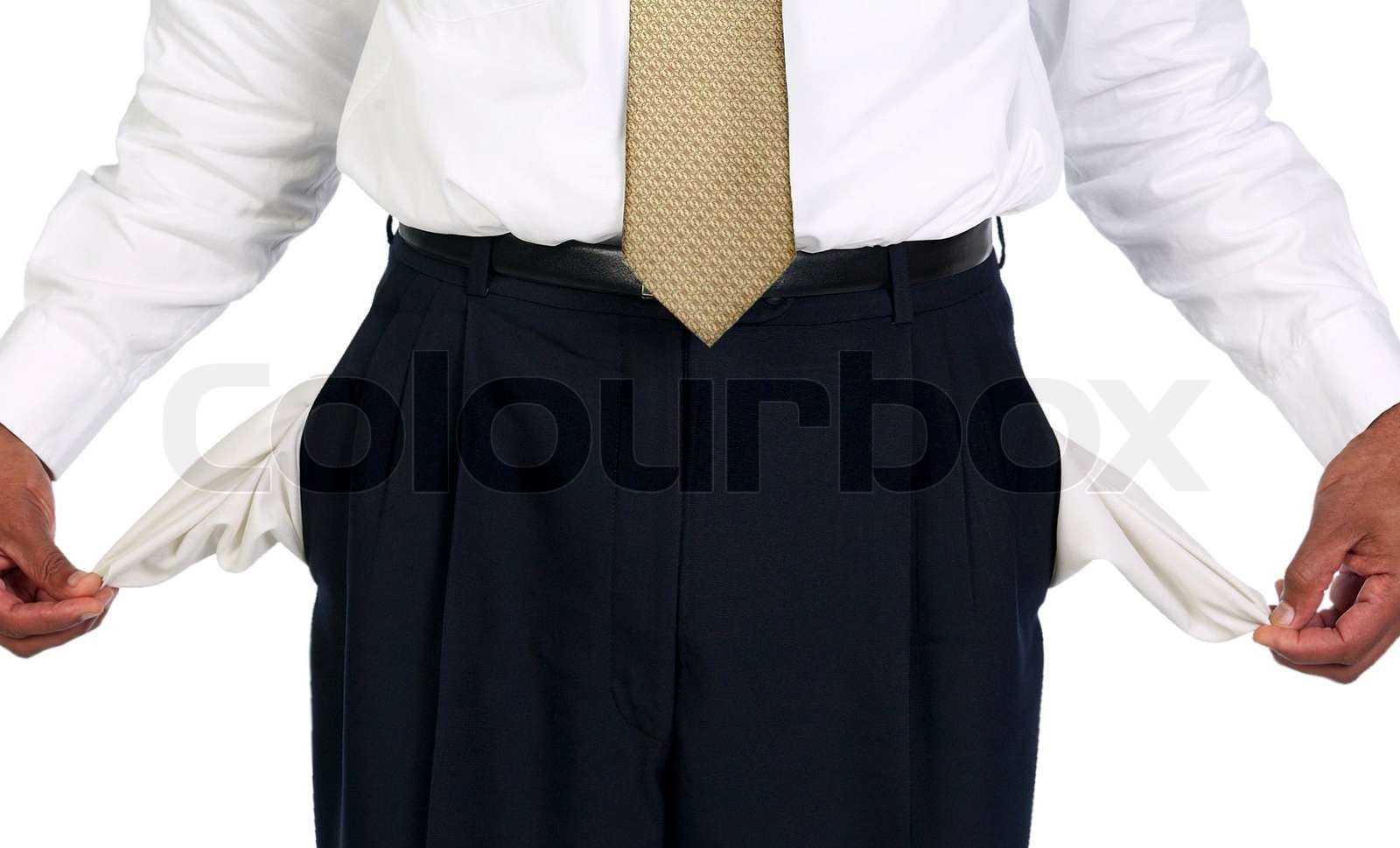 Man Pulling out Empty Pockets on Isolated | Stock image | Colourbox