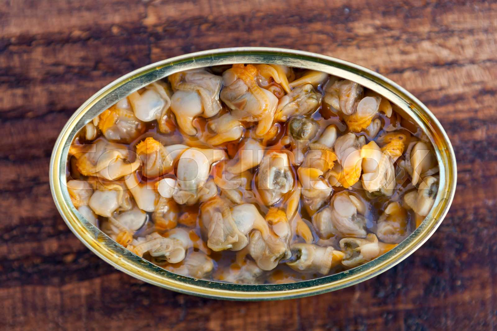 Cans of canned cockles | Stock image | Colourbox