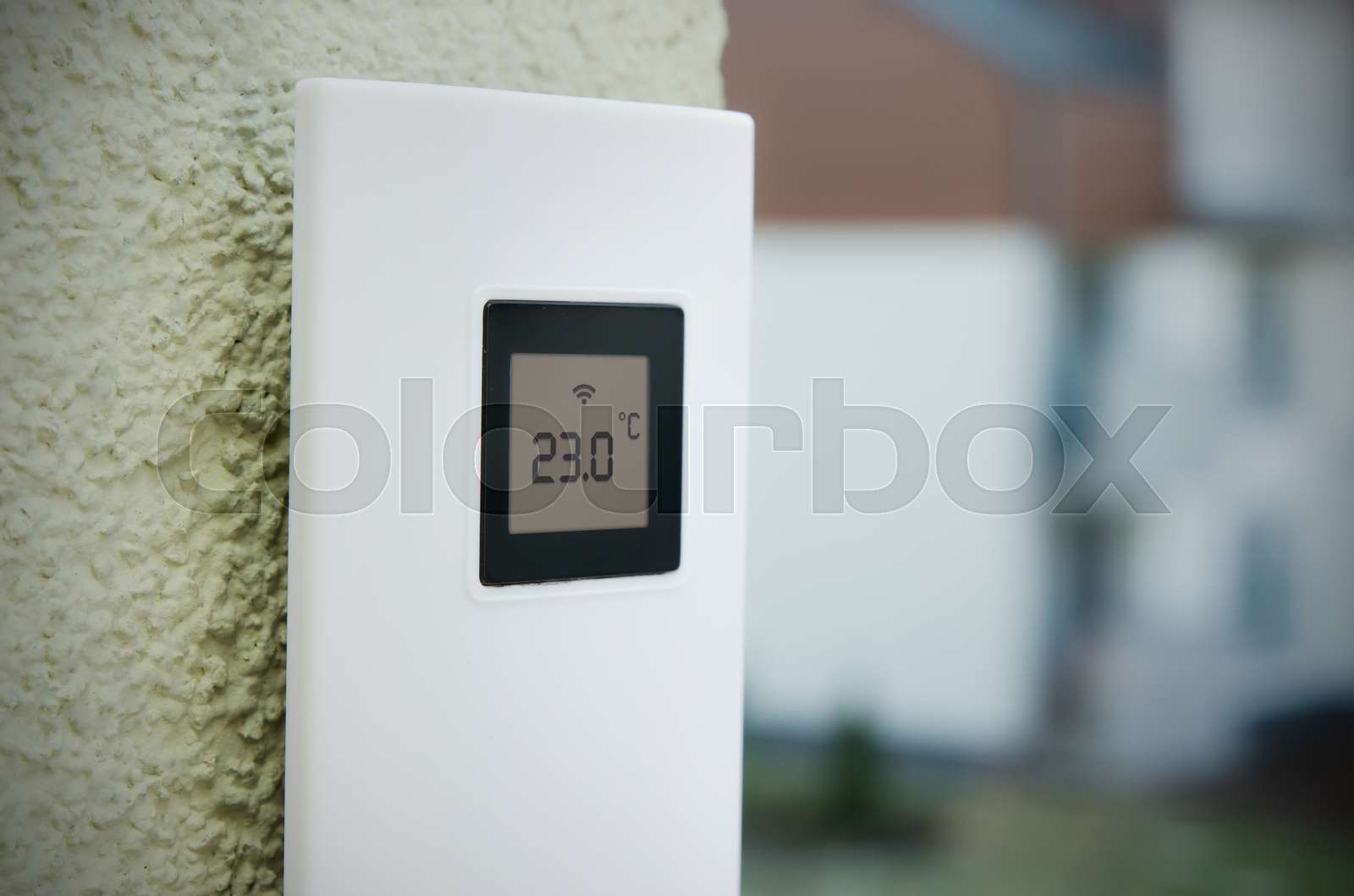 Wireless weather meter installed outdoor | Stock image | Colourbox