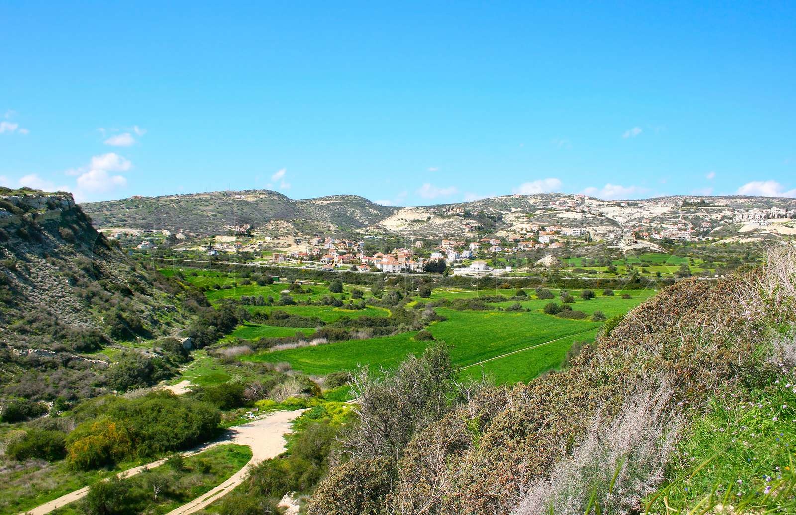 Cyprus landscape with hills,gardens,road and houses | Stock image ...