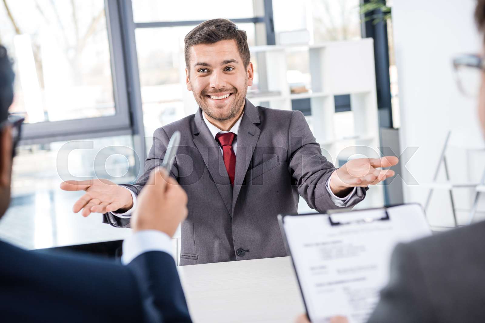 smiling businessman having job interview, business concept | Stock ...