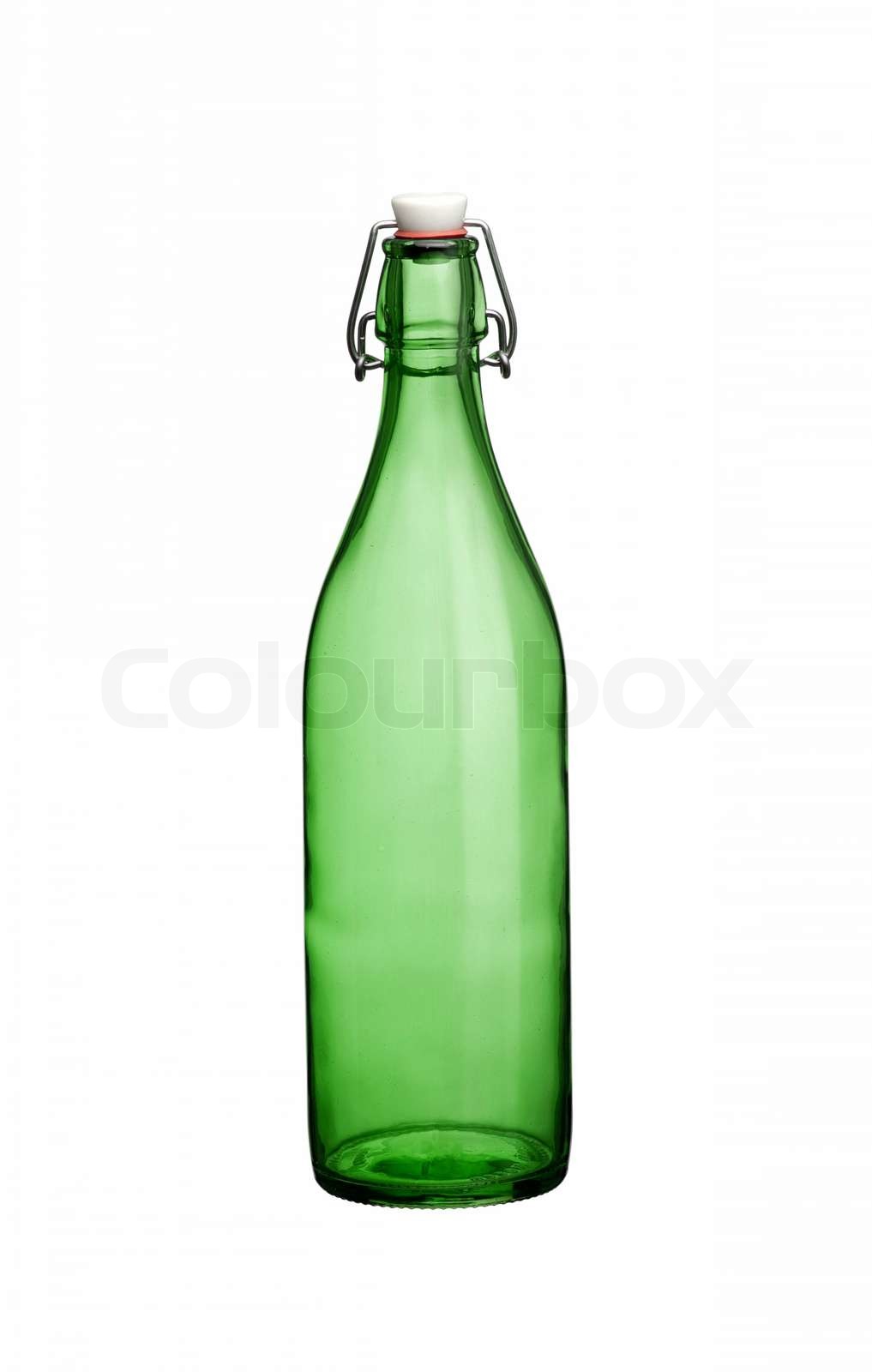 Grøn flaske isoleret på den hvide baggrund | Stock foto | Colourbox