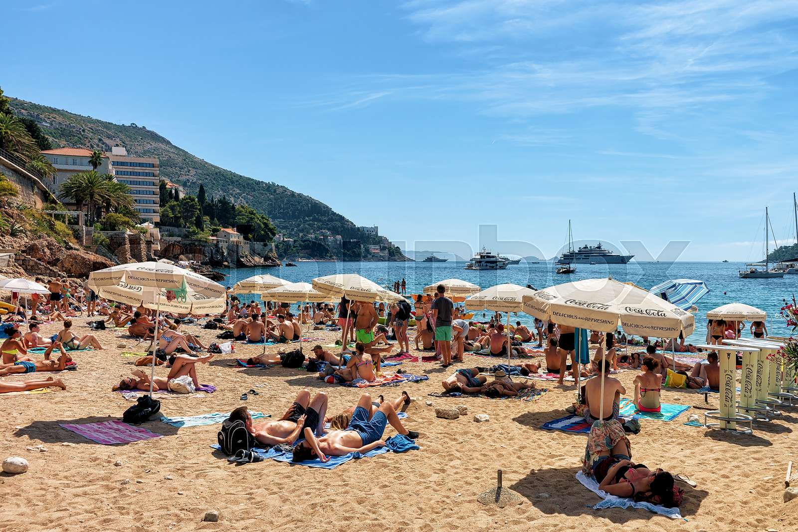 People sunbathing on beach in Adriatic Sea Dubrovnik | Stock image ...