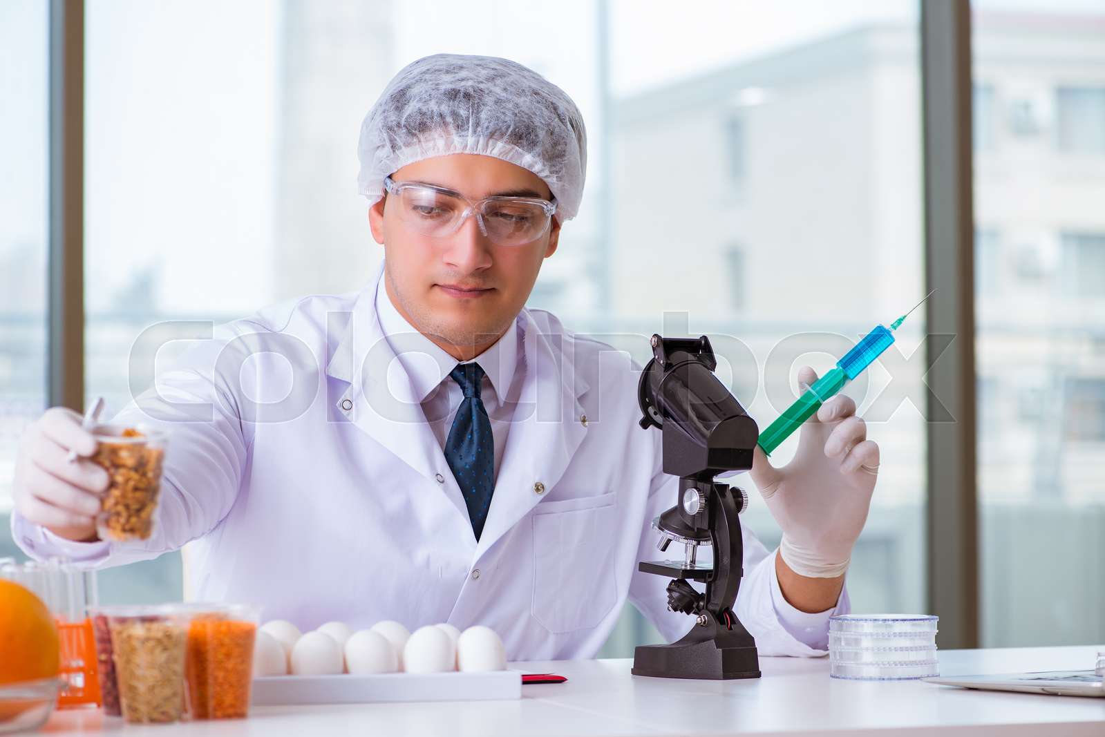 Nutrition expert testing food products in lab | Stock image | Colourbox