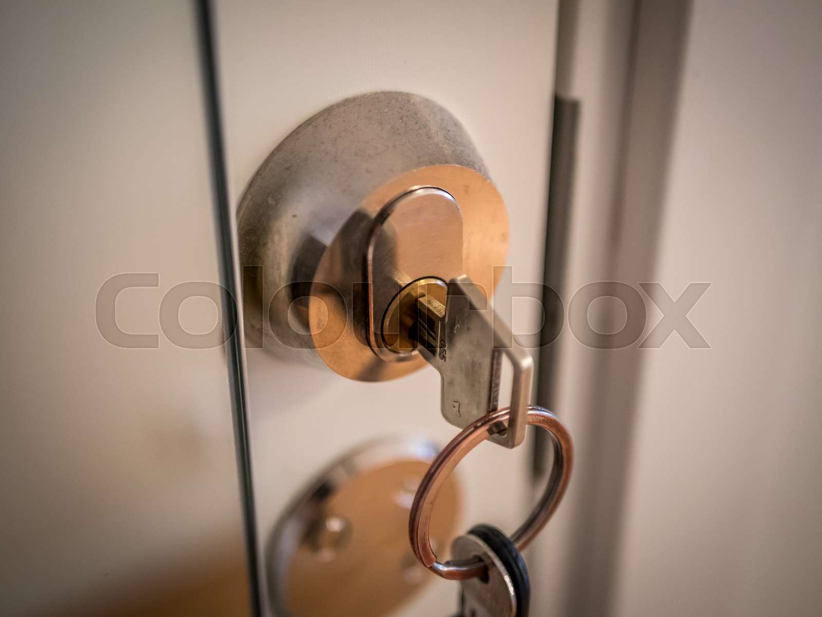 Keys in lock | Stock image | Colourbox