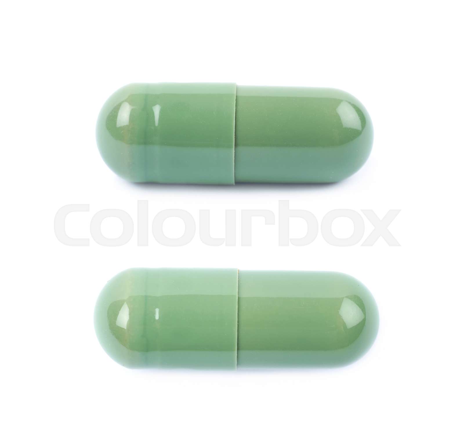 Single softgel capsule pill isolated | Stock image | Colourbox