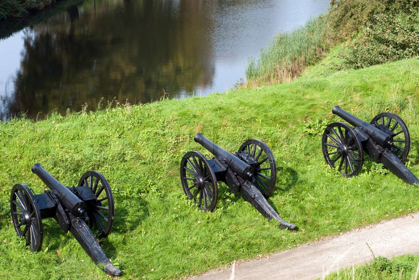 Three vintage mobile cannons | Stock image | Colourbox