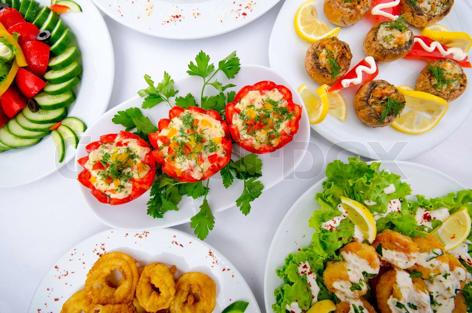 Table served with tasty meals | Stock image | Colourbox