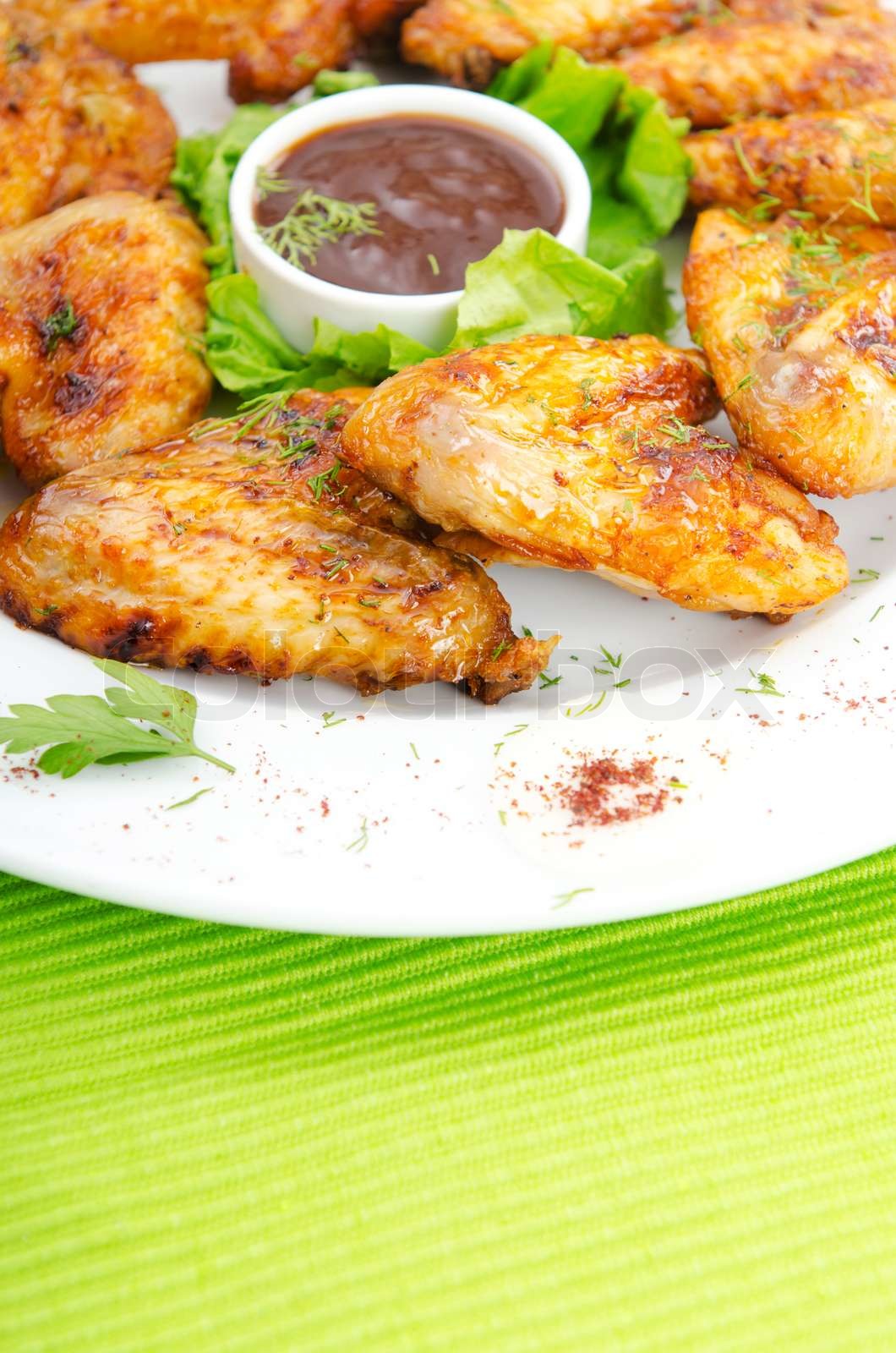 Chicken wings in the plate | Stock image | Colourbox