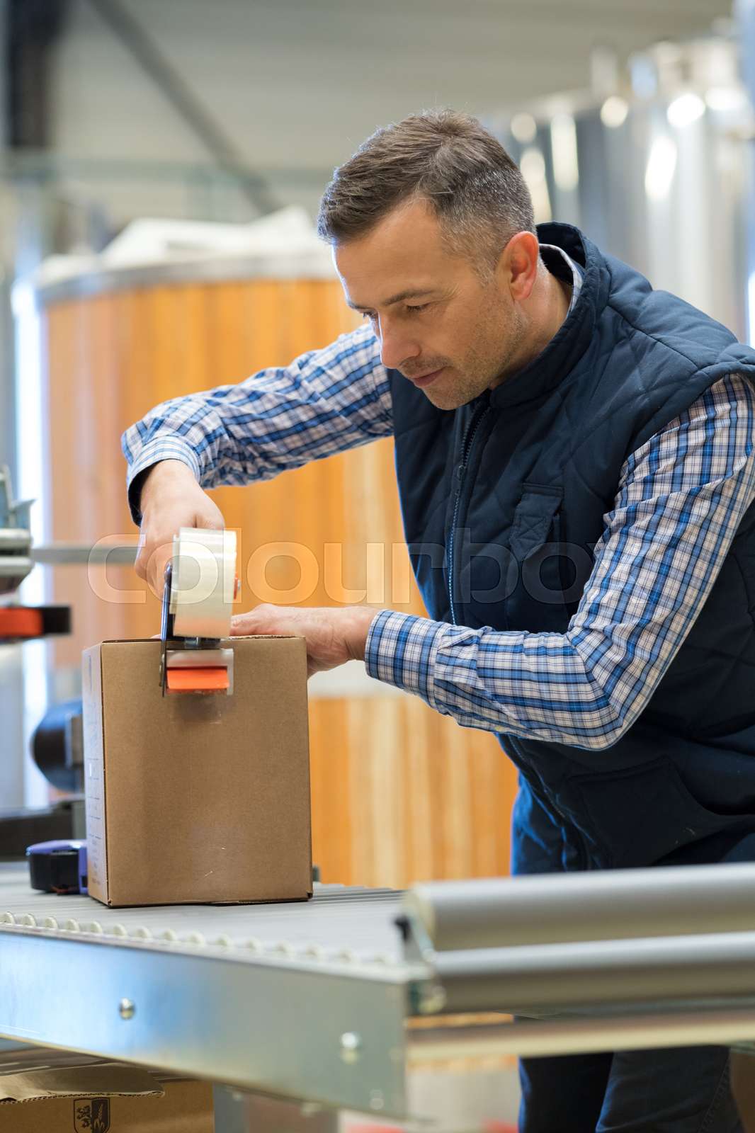 taping the carton | Stock image | Colourbox
