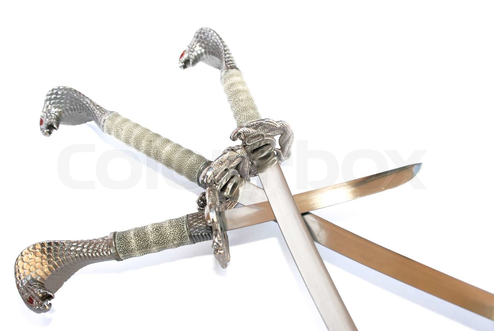 Three daggers isolated on white | Stock image | Colourbox