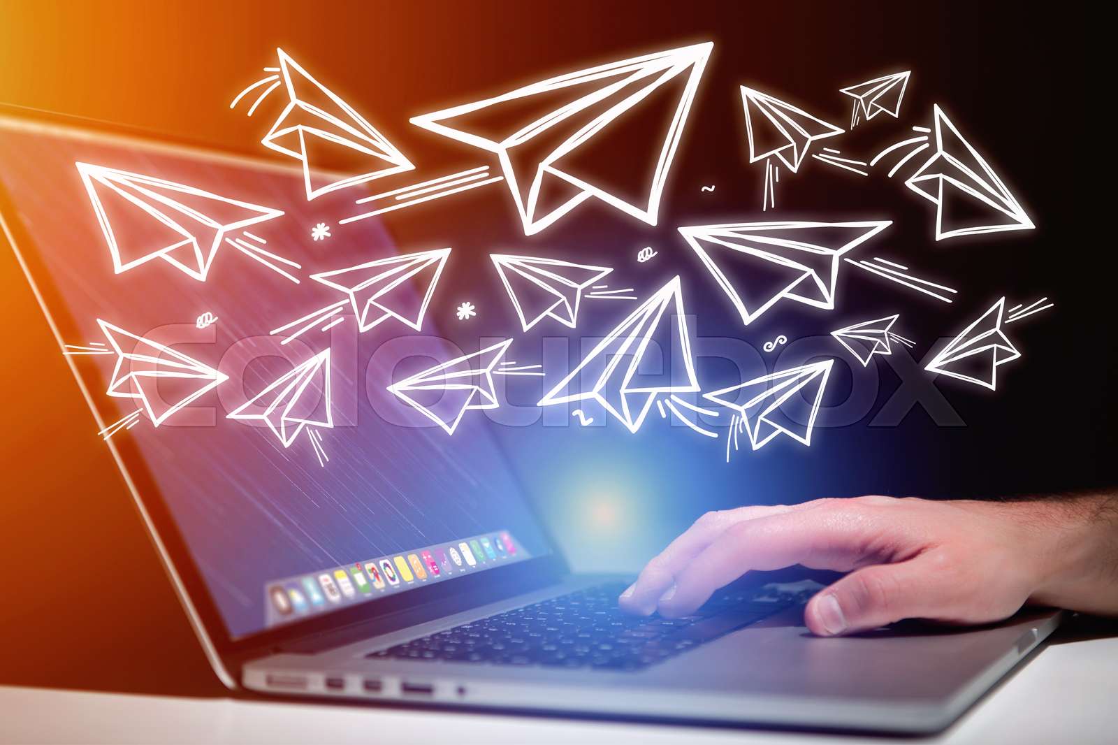 Concept of creativity with flying paper plane over a laptop | Stock ...