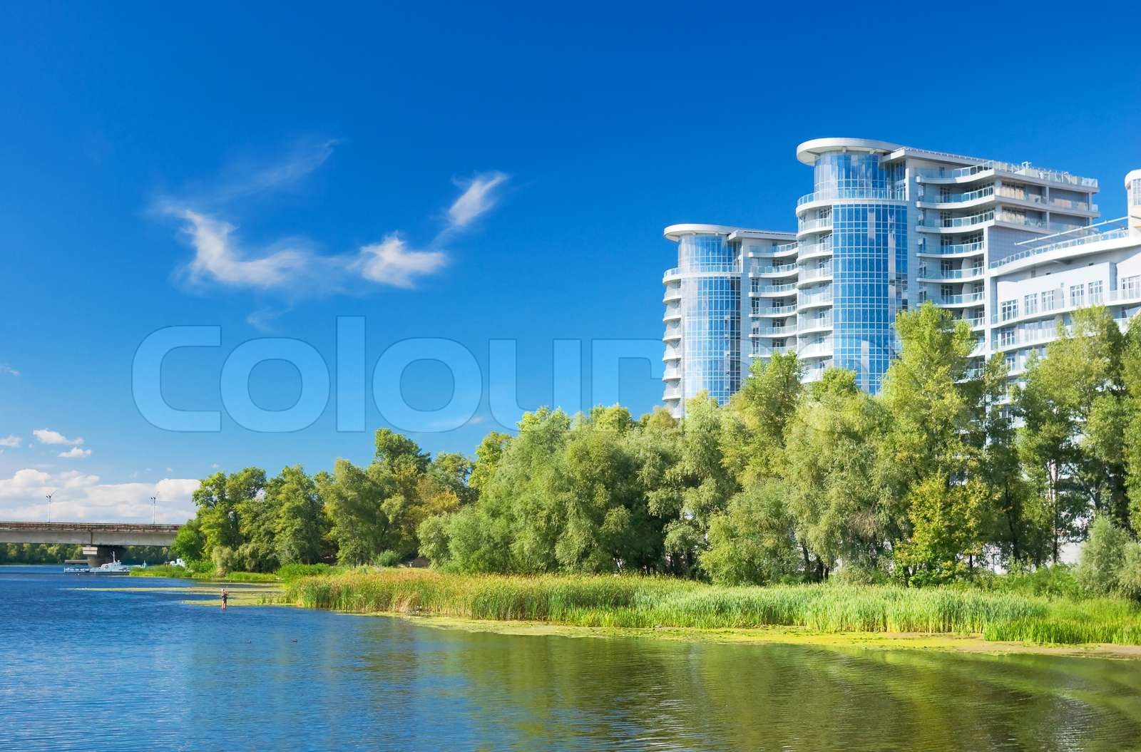 High rise apartment buildings by the riverside | Stock image | Colourbox