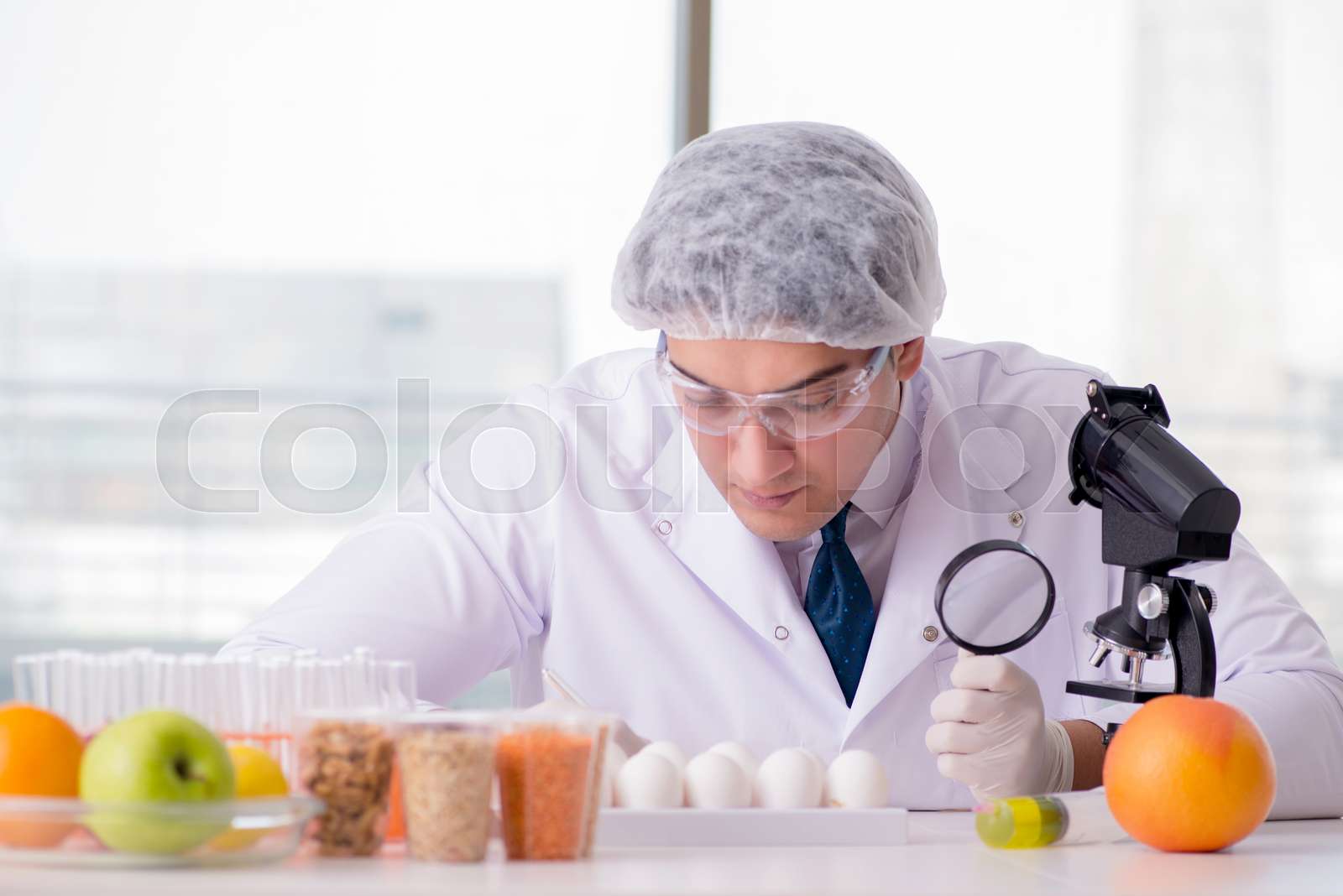Nutrition expert testing food products in lab | Stock image | Colourbox