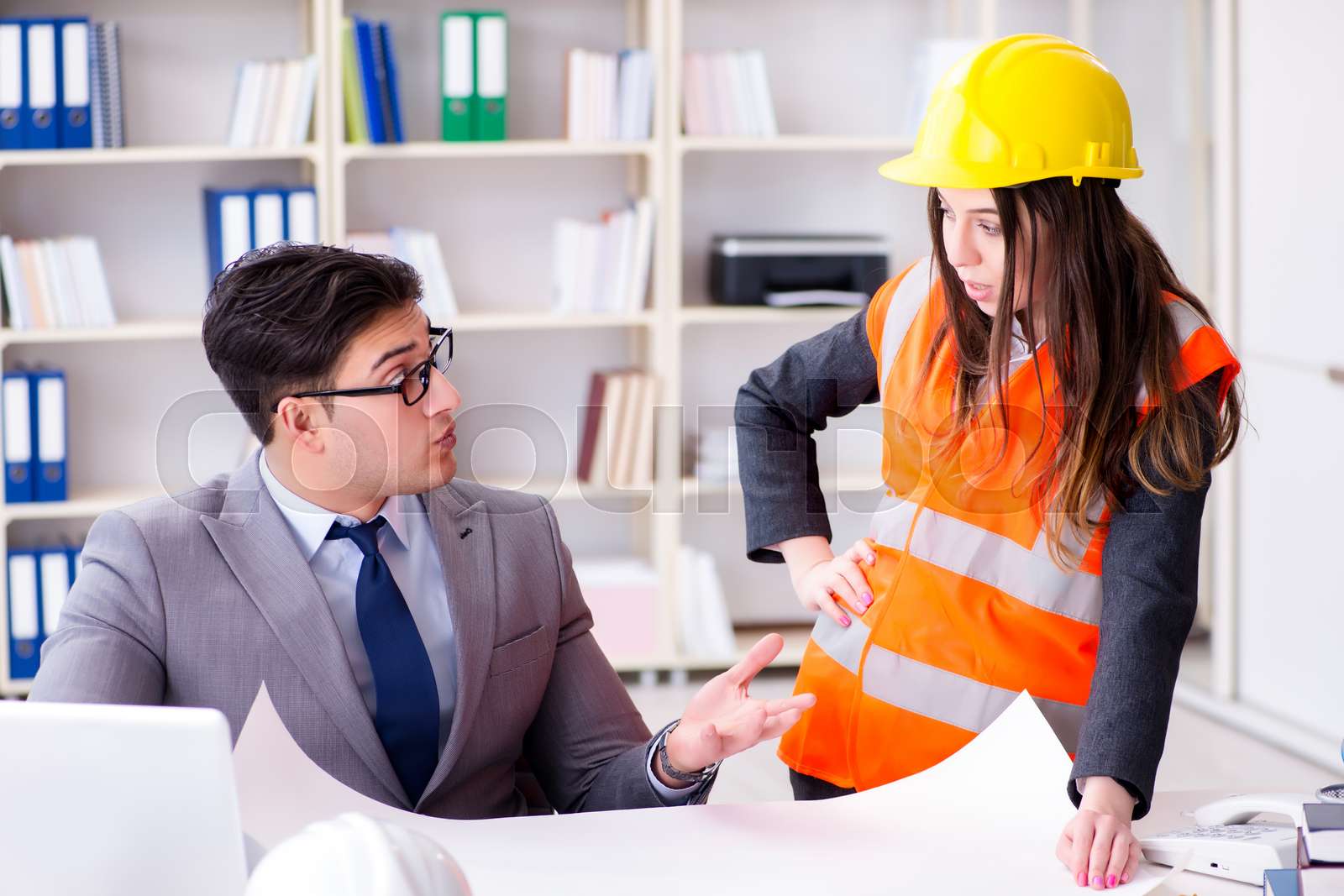 Construction foreman supervisor reviewing drawings | Stock image ...