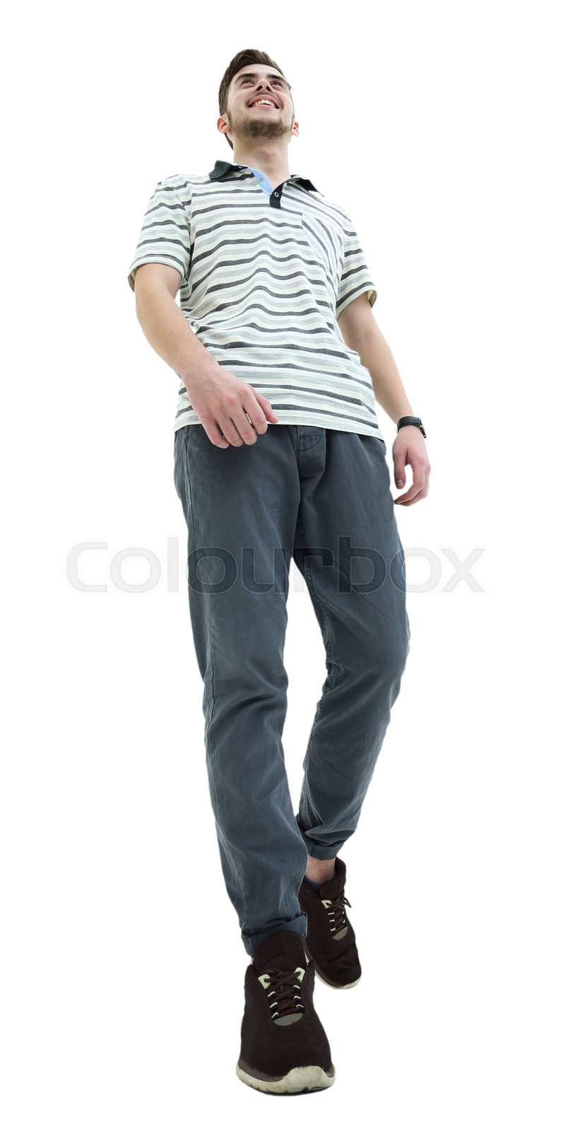 Picture of a smiling business man stepping on something, over wh ...