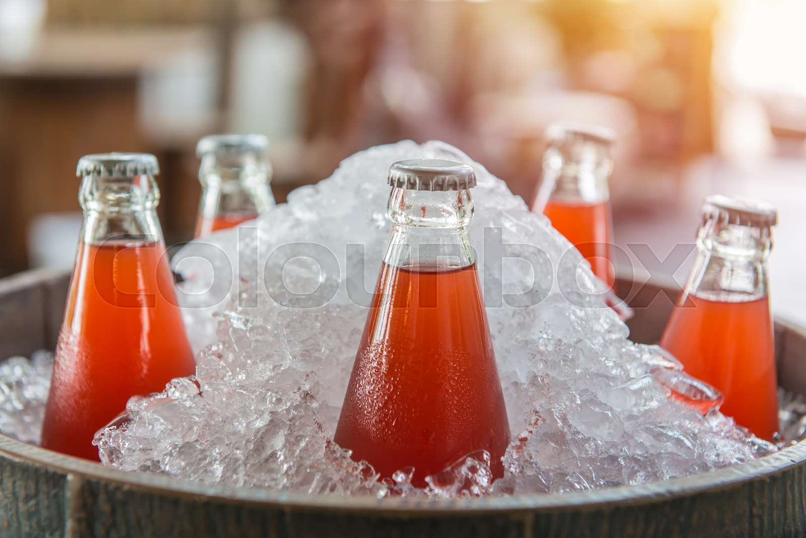 Strawberry juice bottle ice cold in the icebox | Stock image | Colourbox
