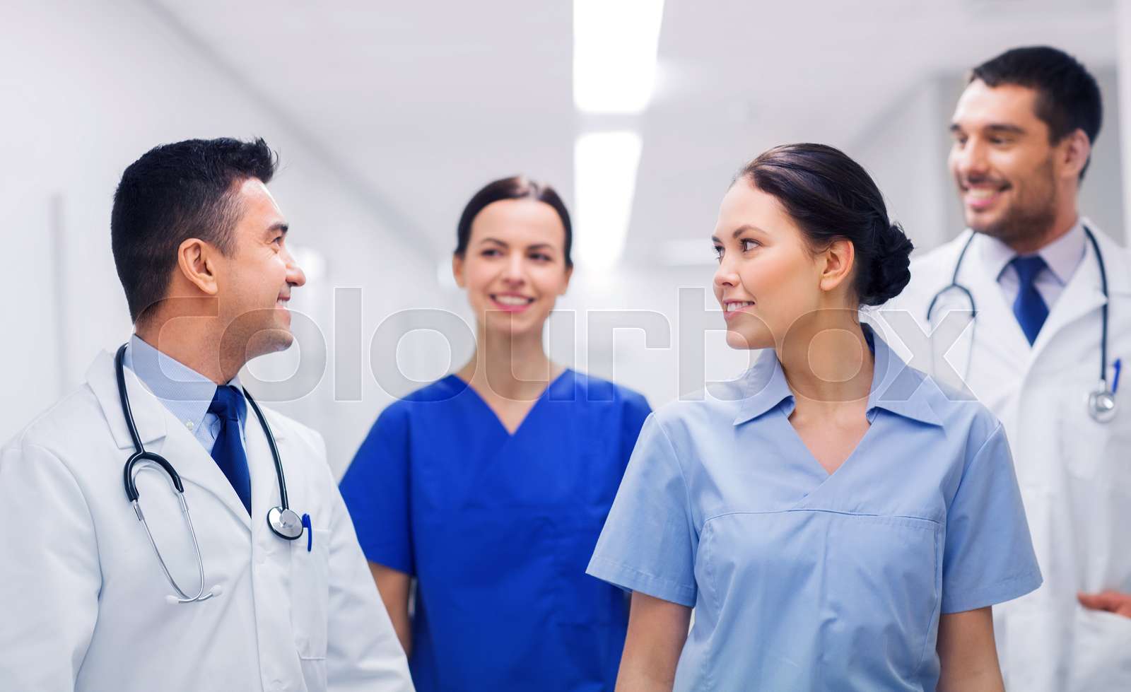 happy group of medics or doctors at hospital | Stock image | Colourbox