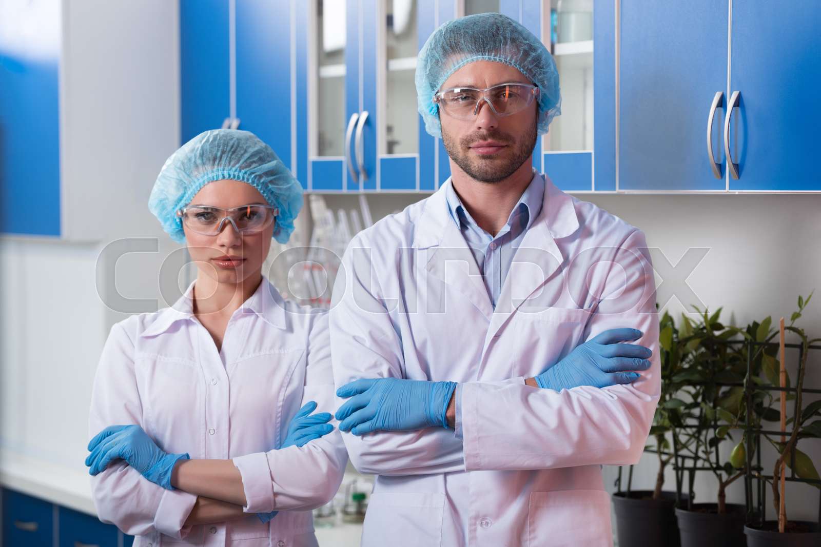 Scientists at chemical laboratory during work | Stock image | Colourbox