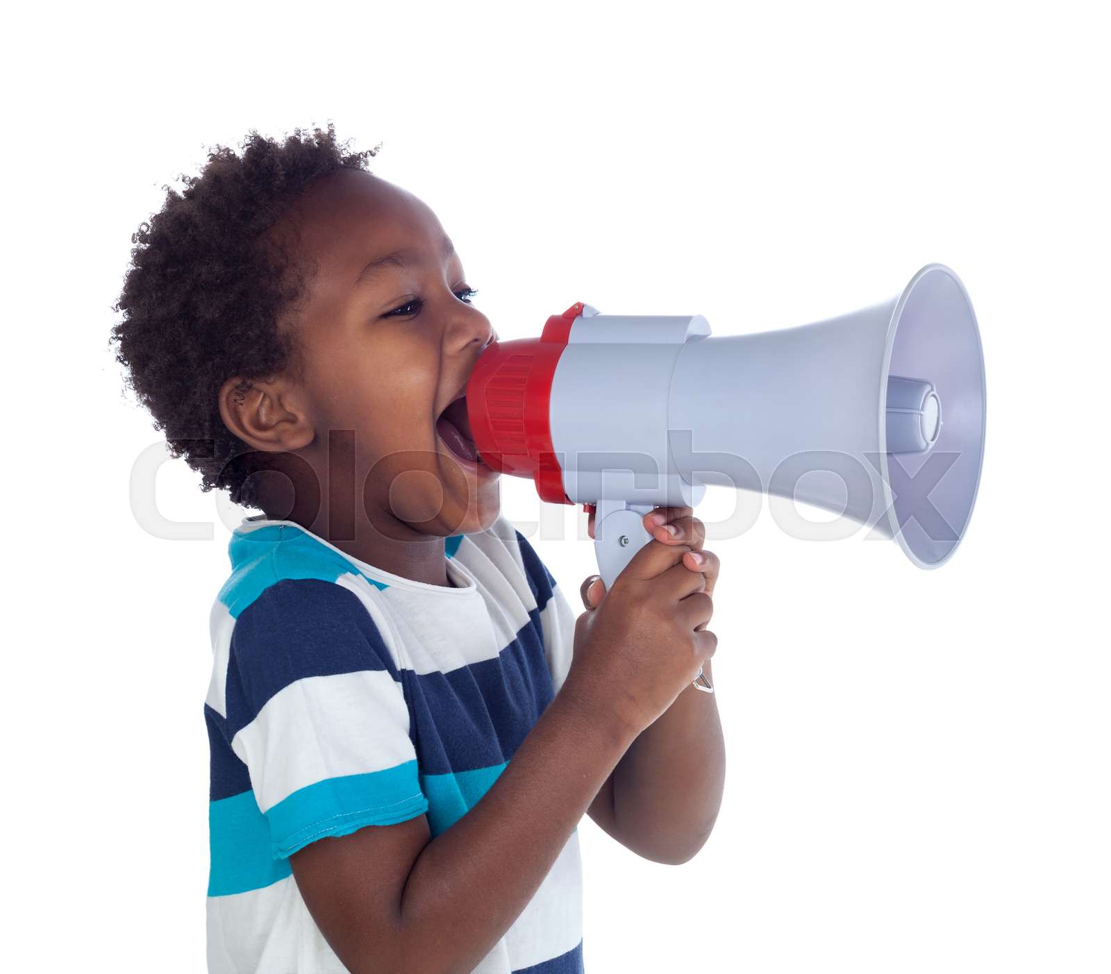 Small boy shouting through a megaphone | Stock image | Colourbox