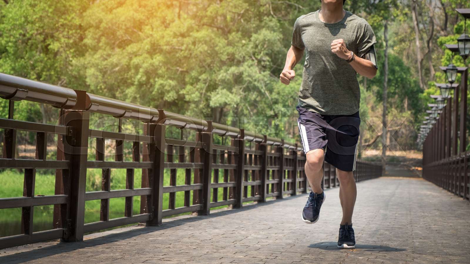 Running man. Male runner at sprinting speed training for marathon ...