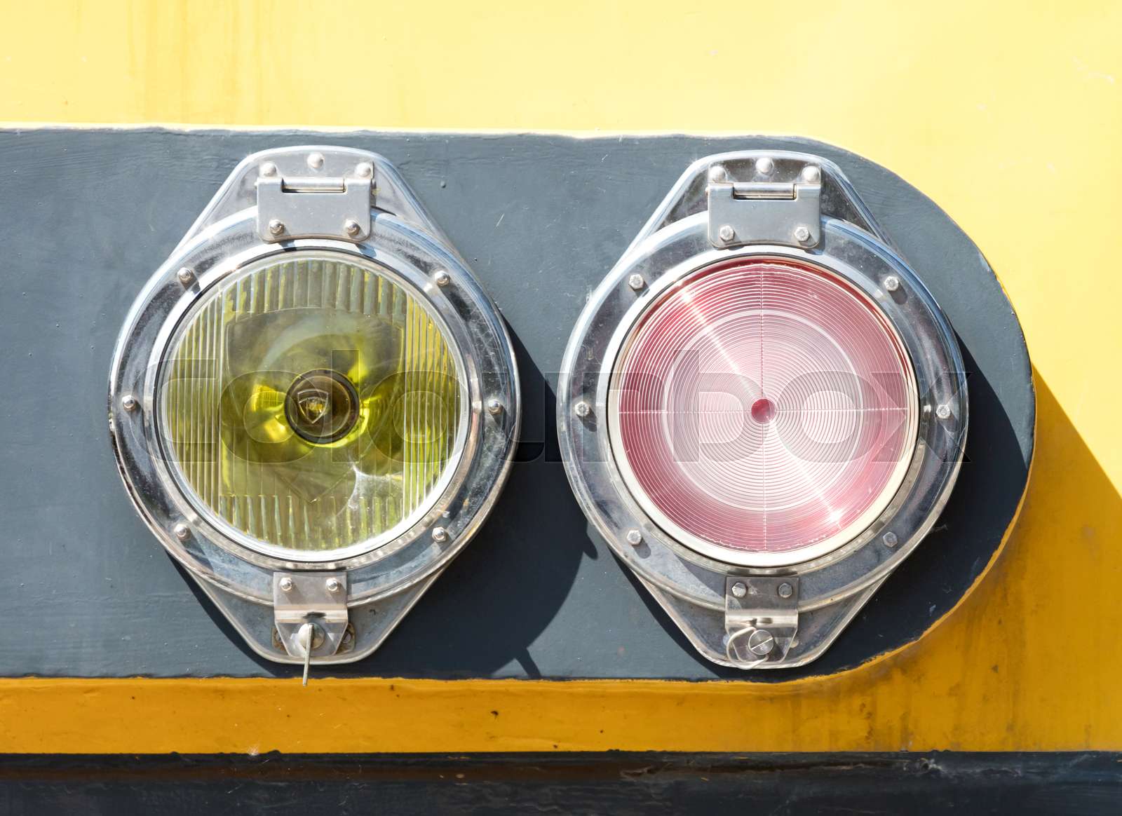 Closeup of a train headlight shining | Stock image | Colourbox