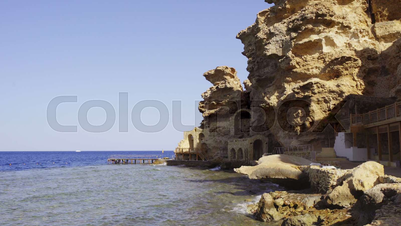 Steep rocky beach in summer | Stock video | Colourbox